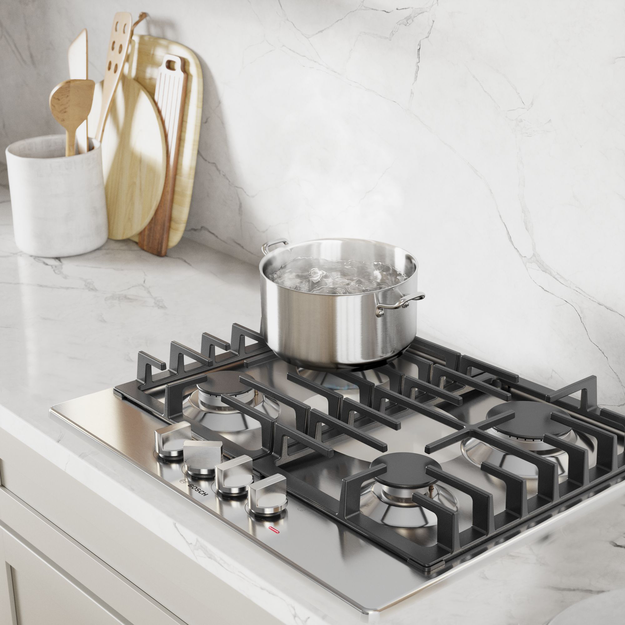 Bosch 500 Series 24 in. 4-Burner Natural Gas Cooktop with Simmer Burner ...